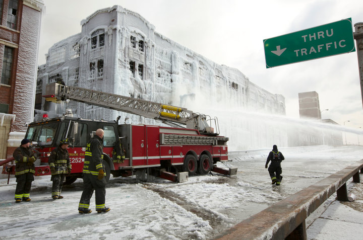 Chicago Firefighters continue to battle a warehouse fire for a third ...